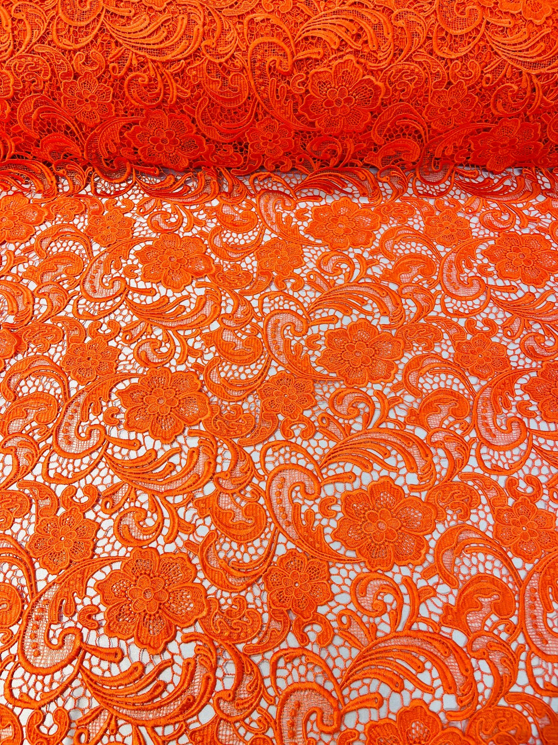 Orange lace material store